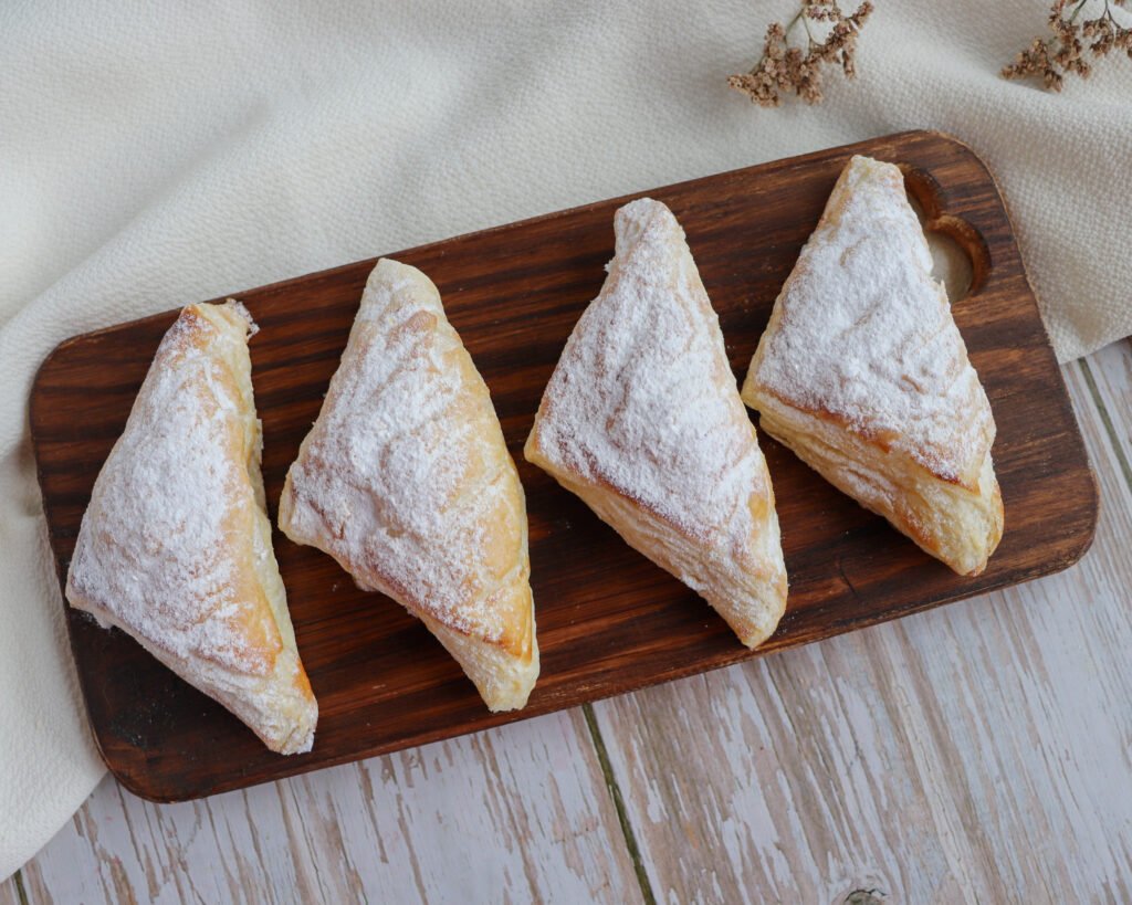 Triângulo folhado com Creme – Girassol